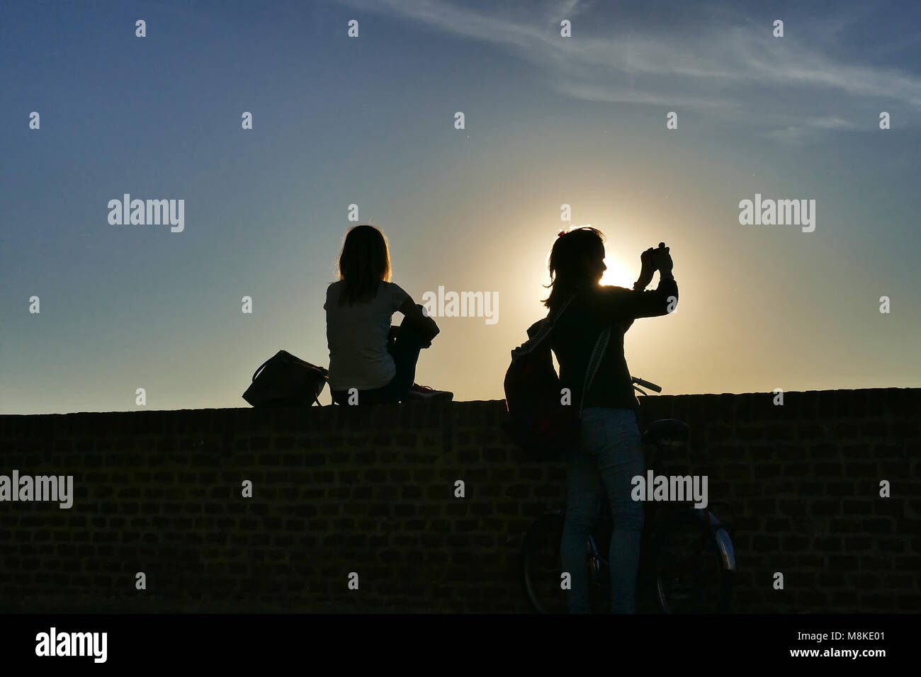 Two women back view silhouette hi-res stock photography and images - Alamy
