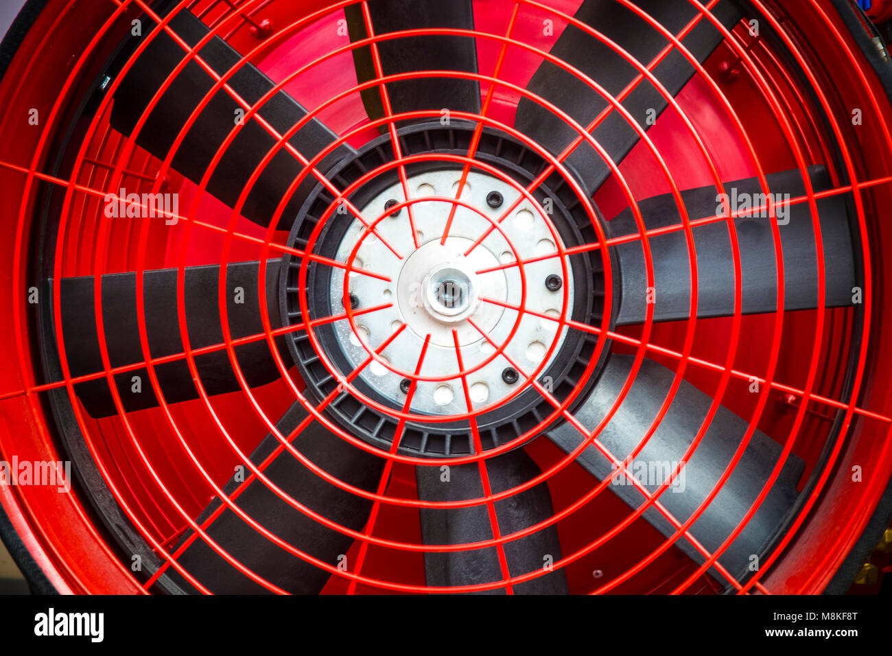 red and black fan near the tractor, close-up, background image Stock ...