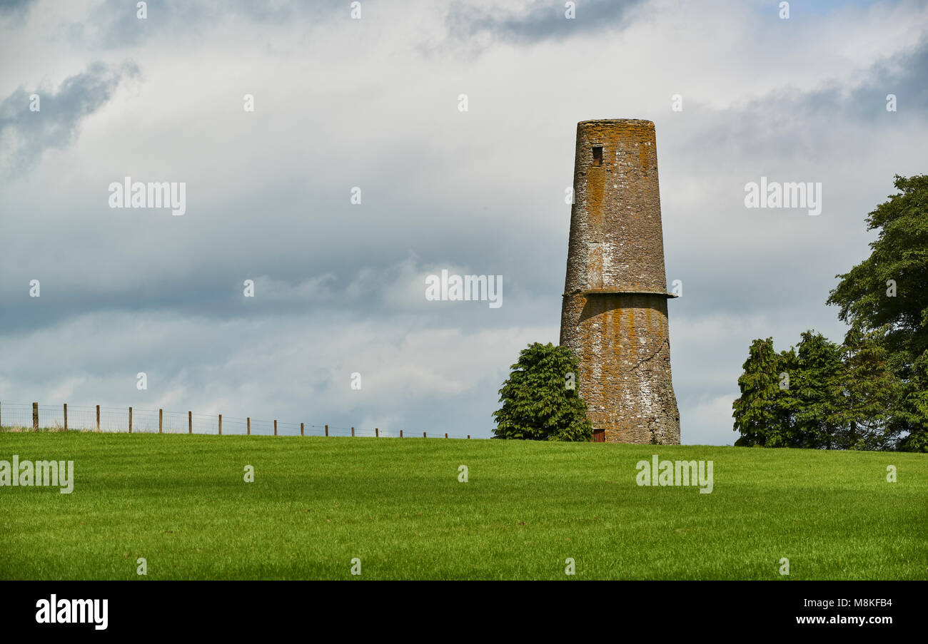 An Old Scottish Windmill in a grass field in Rural Angus, Scotland ...