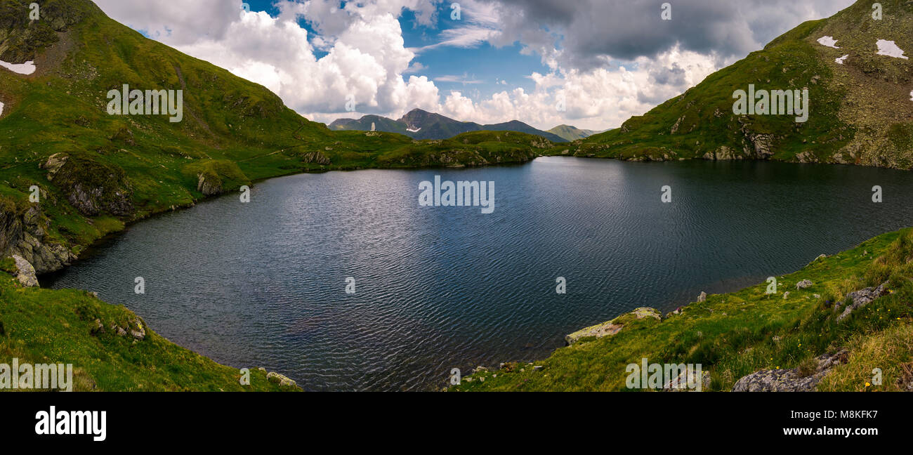 panorama of Capra lake, Romania. gorgeous landscape of Fagarasan ...