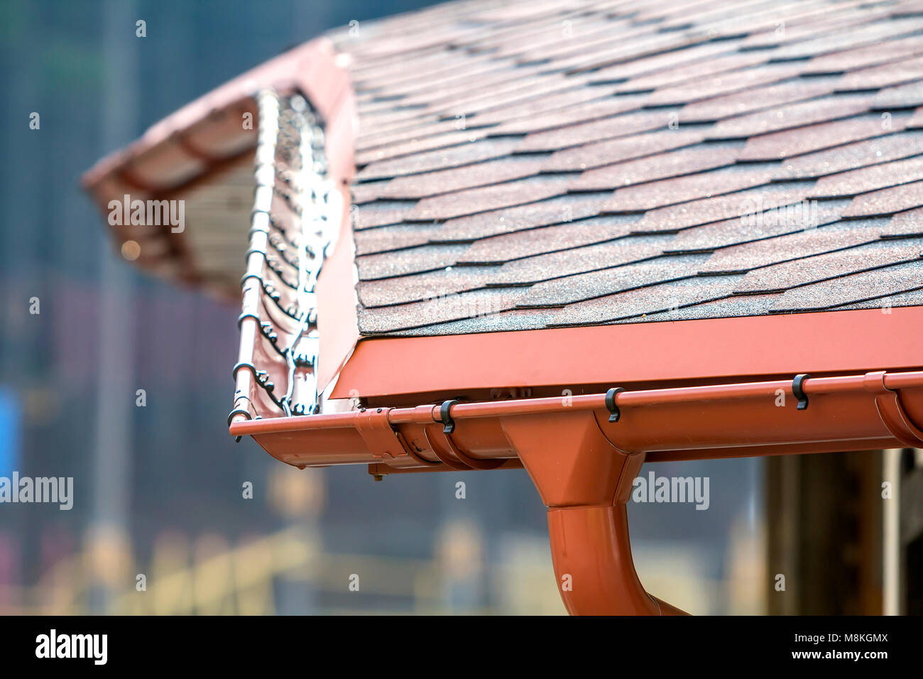 Detail image of new roof with gutter rain system Stock Photo - Alamy
