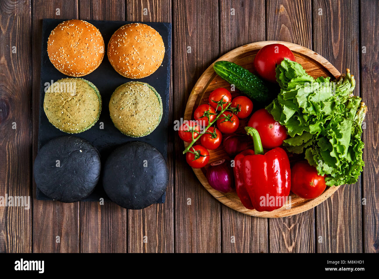 Different colored buns for burgers Stock Photo - Alamy