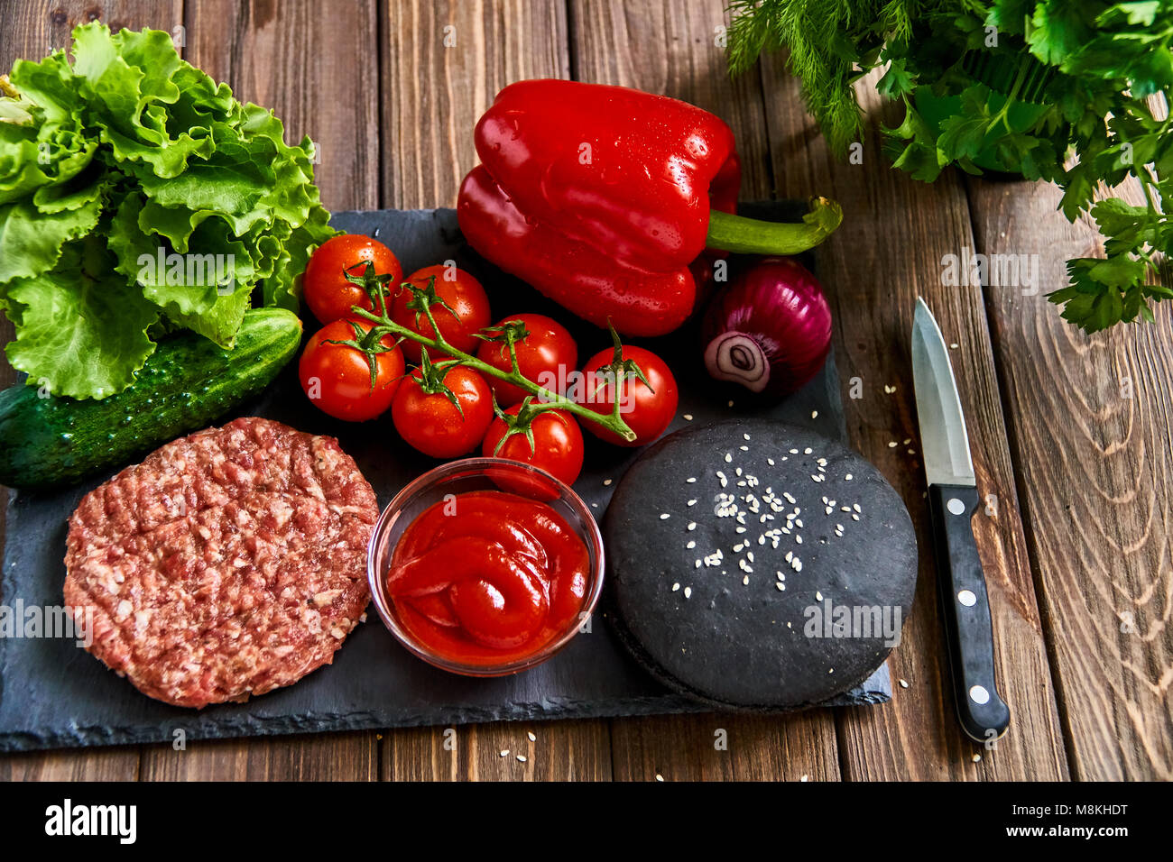Preparation of burger Stock Photo - Alamy