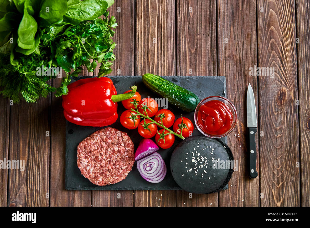 Preparation of burger Stock Photo - Alamy