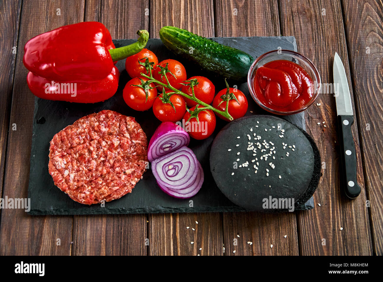 Preparation of burger Stock Photo - Alamy