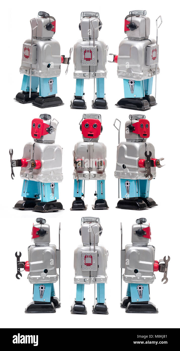 Vintage retro red face tin toy robot isolated on a white background ...