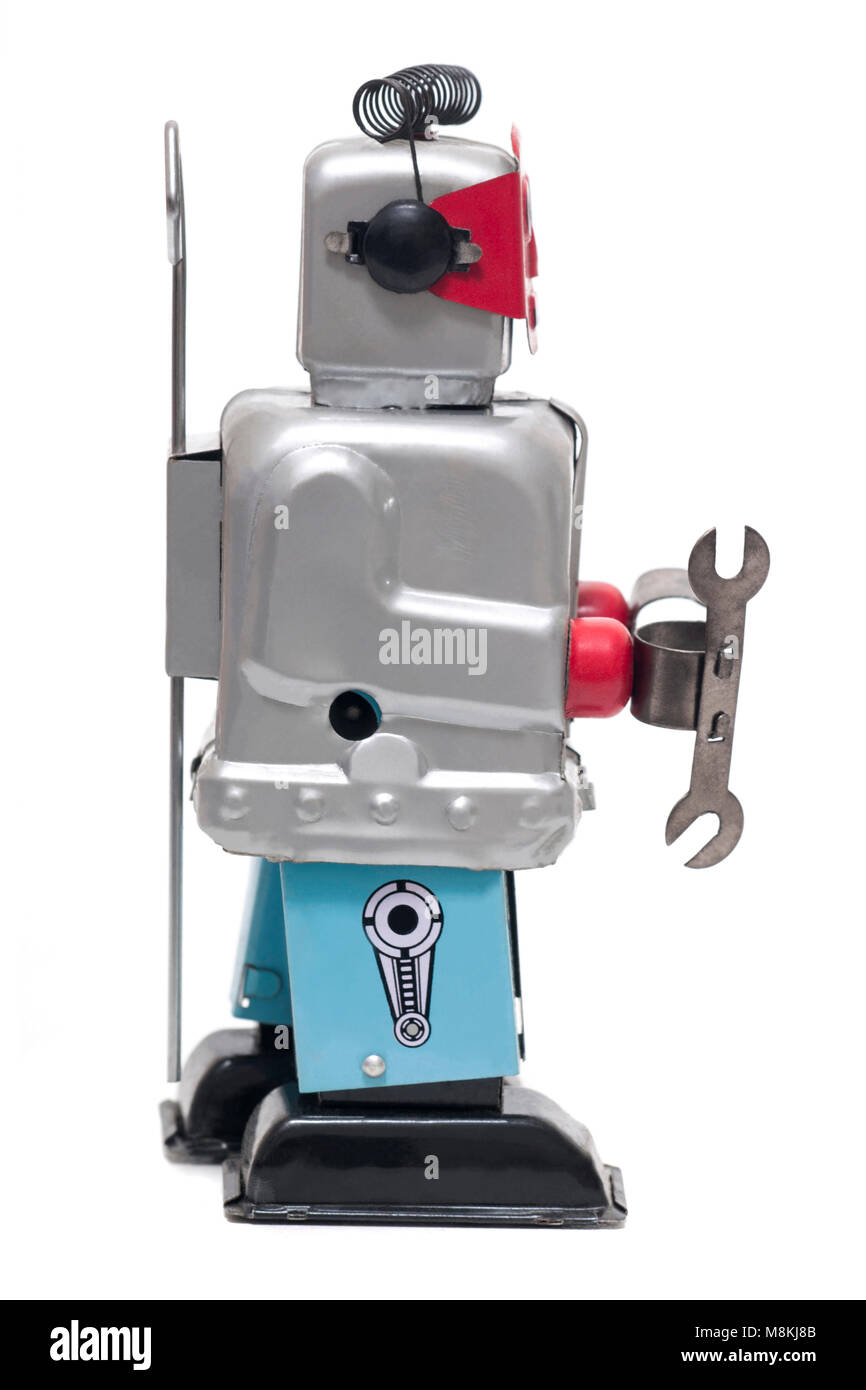 Vintage retro red face tin toy robot isolated on a white background ...
