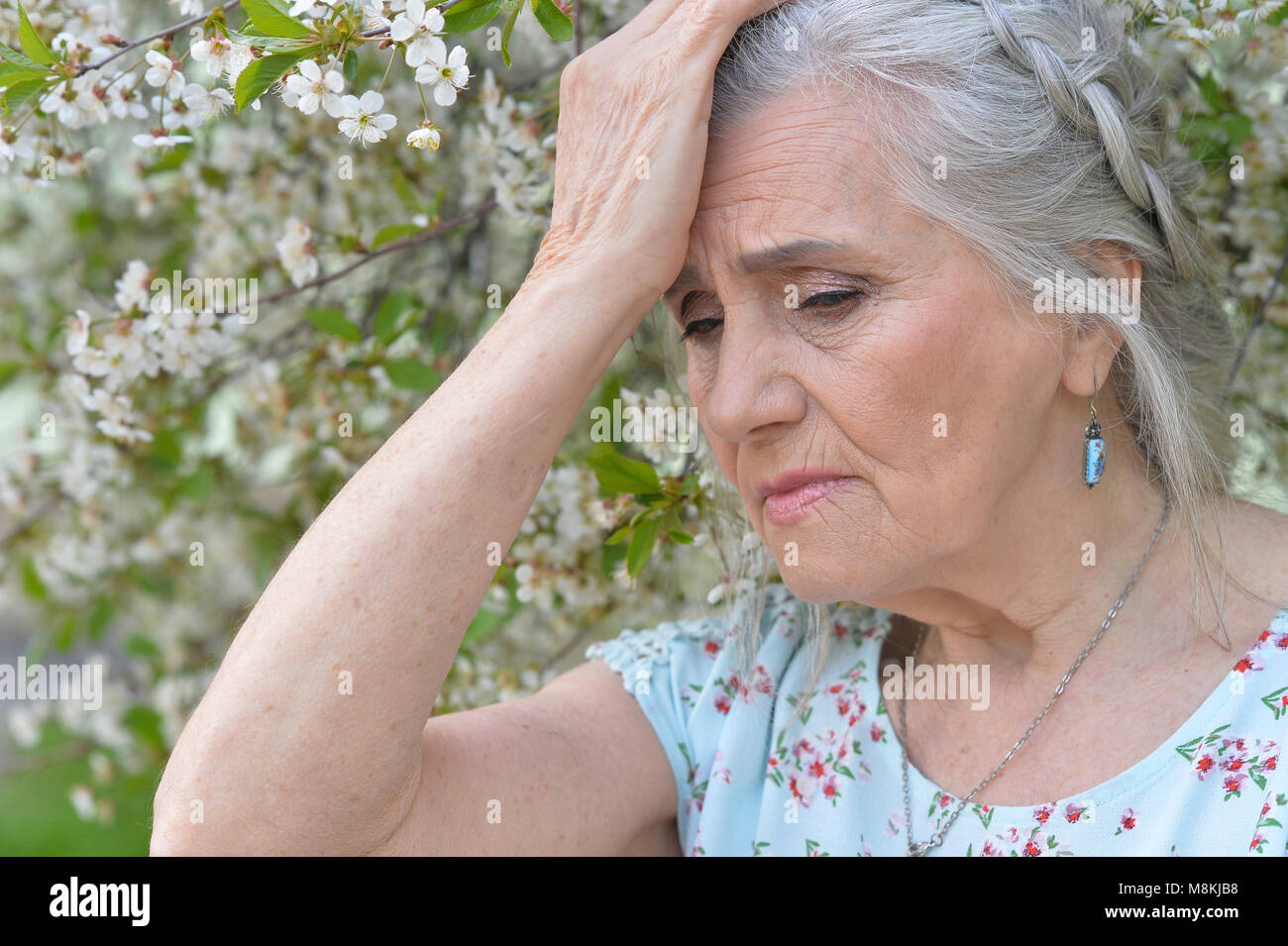 sad senior woman Stock Photo - Alamy