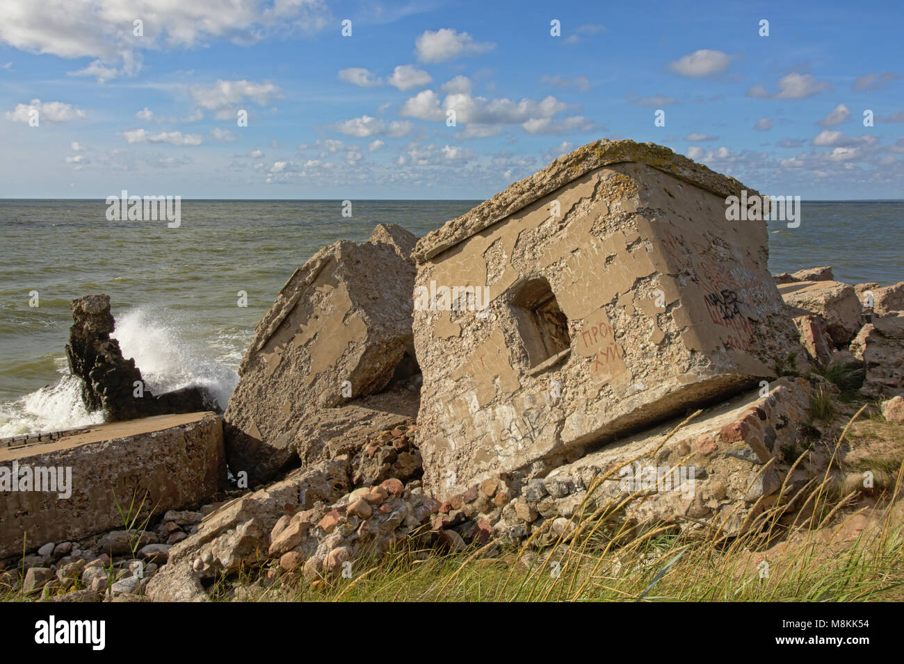 Waves splashing against remains of bombarded Sovjet fort in the ...