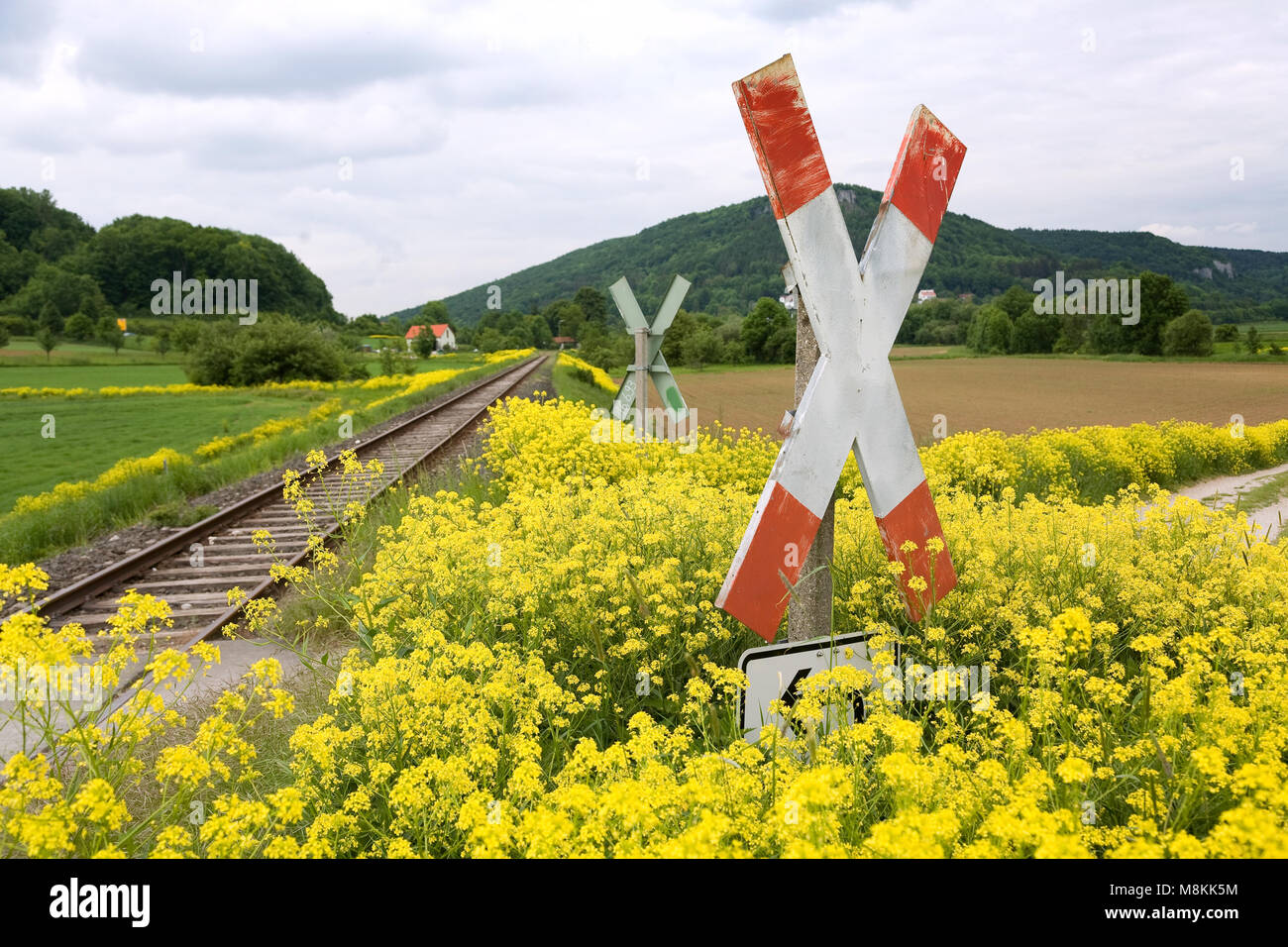 Level railroad crossing in Forchheim, Franconia, Bavaria, Germany with ...