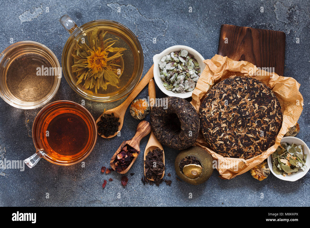 Different sorts of tea; Asian pressed pu-erh tea, shu pu'er in ...
