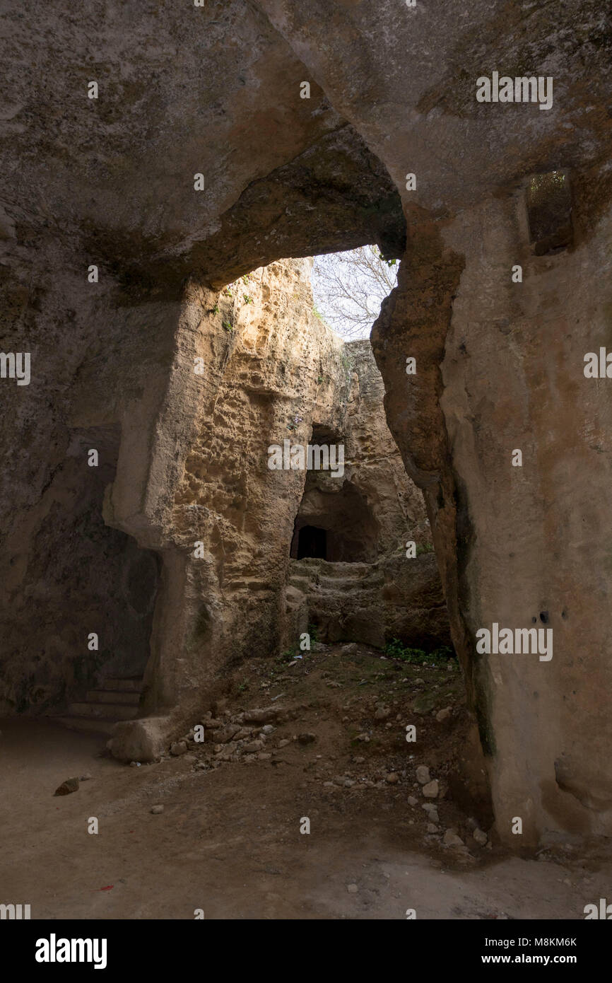 Gap in the limestone cliff near the Agia Solomoni & the Christian ...