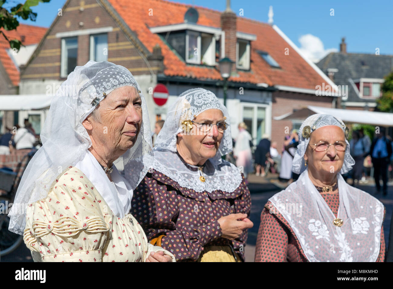 Dutch women with traditional clothing and headgear at local fair Stock ...