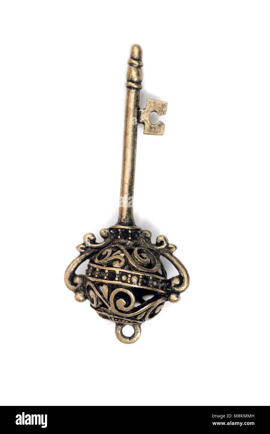 vintage fantasy detailed golden key isolated on a white background ...