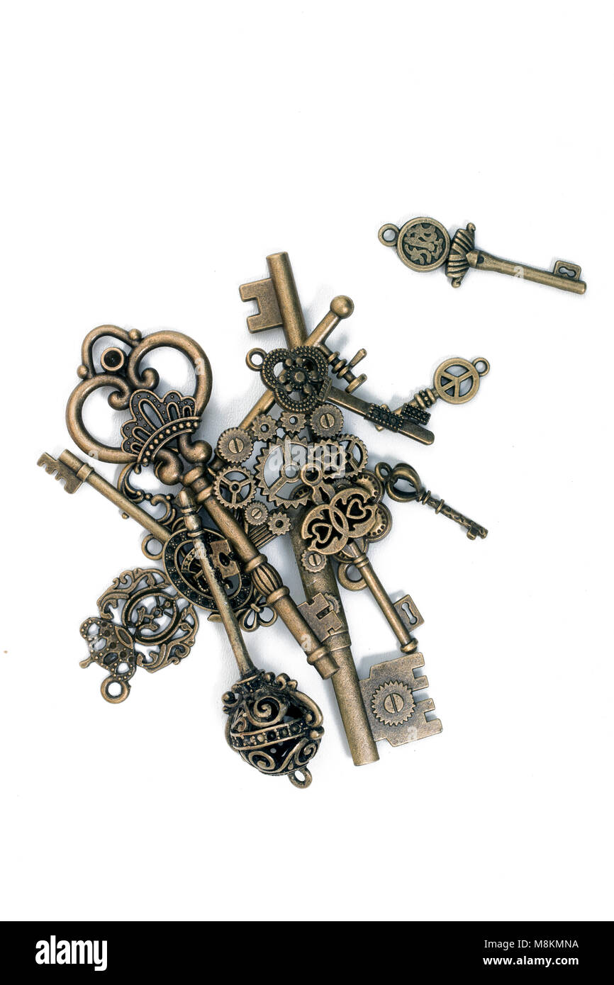 vintage fantasy detailed golden keys isolated on a white background ...