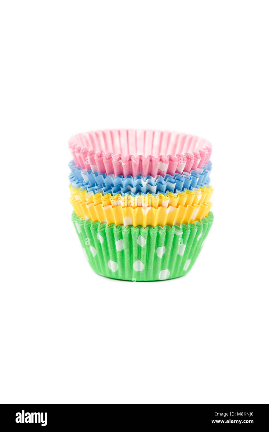 Empty colourful cupcake cases on isolated white background Stock Photo ...