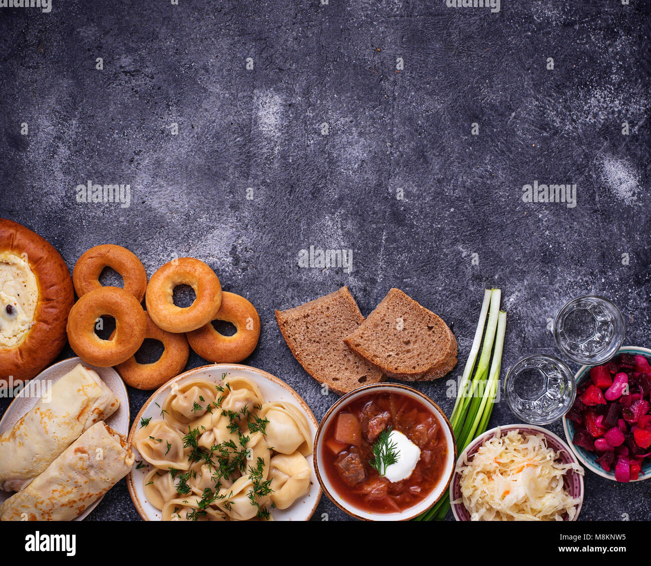 Traditional Russian food. Borscht, pelmeni, vinaigrette sauerkraut ...