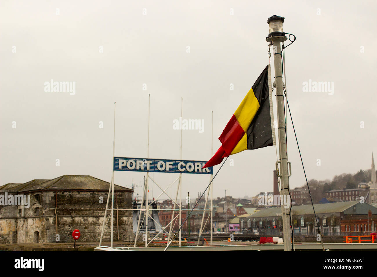 The Belgian National flag flying on the vessel Tridens at Kennedy Wharf ...