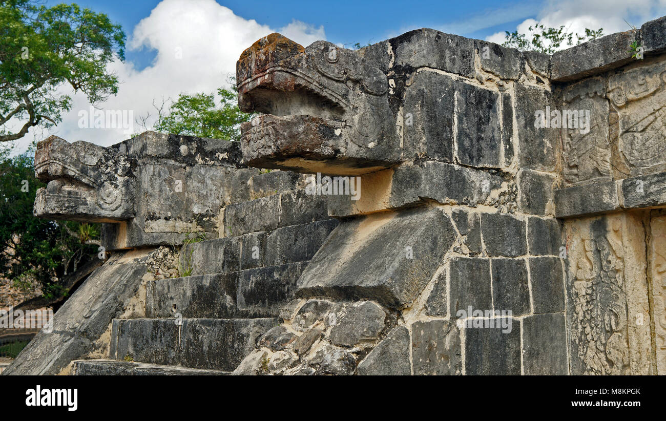 snake stone head in the Chichen Itza, mayan pyramid in Yucatan, Mexico ...