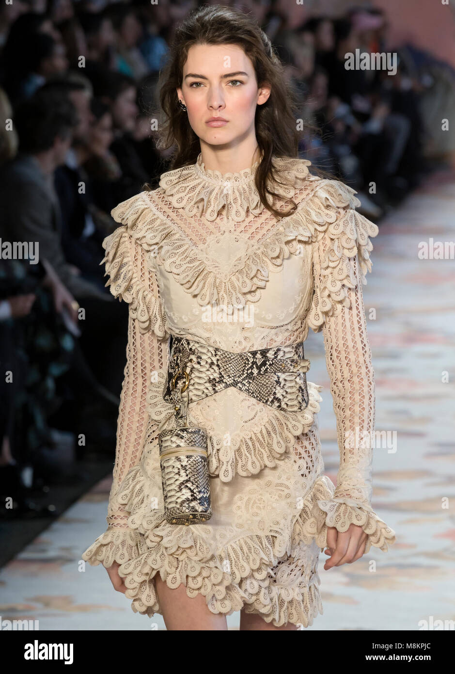 NEW YORK, NY - February 12, 2018: Marie Damian walks the runway at the ...