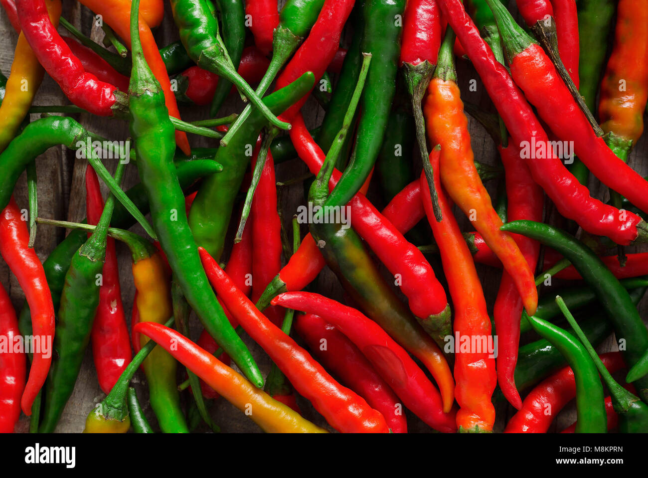 Fresh chilly with textured of background Stock Photo - Alamy