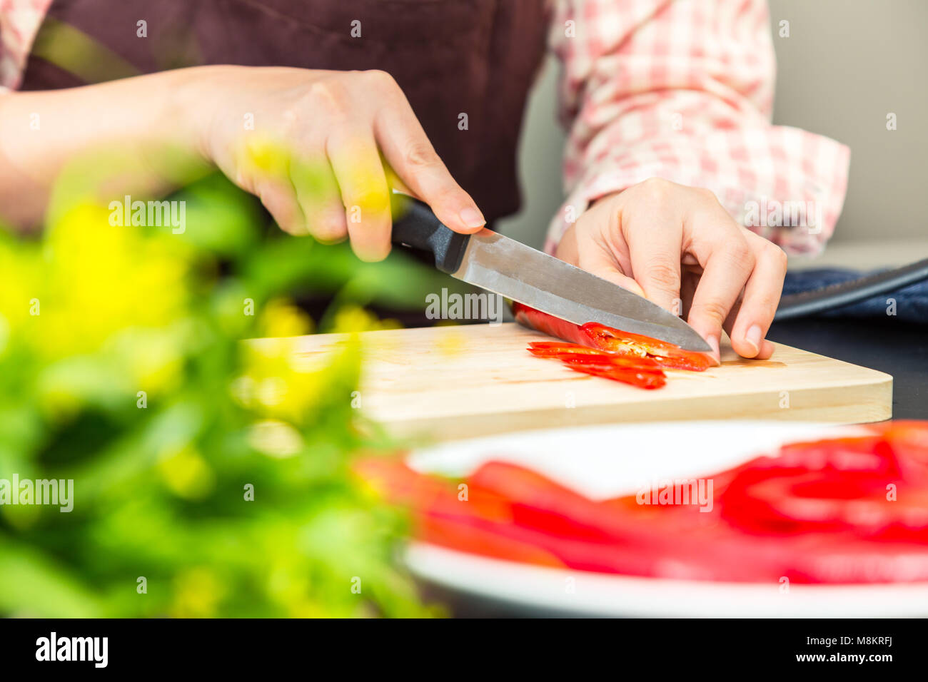 Woman cooking shrimp in kitchen hi-res stock photography and images - Alamy