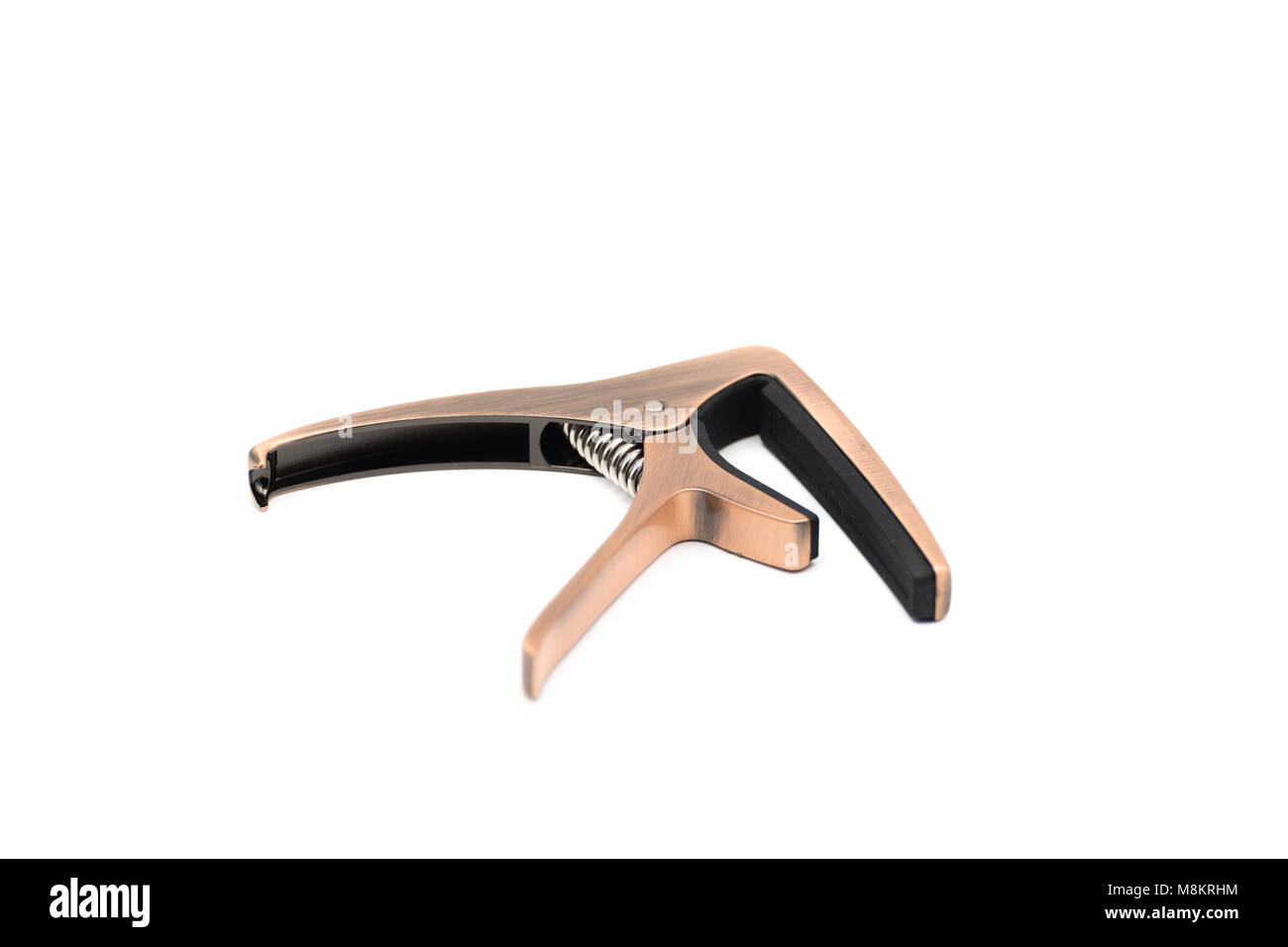 Metal Guitar Capo isolated on white background Stock Photo - Alamy