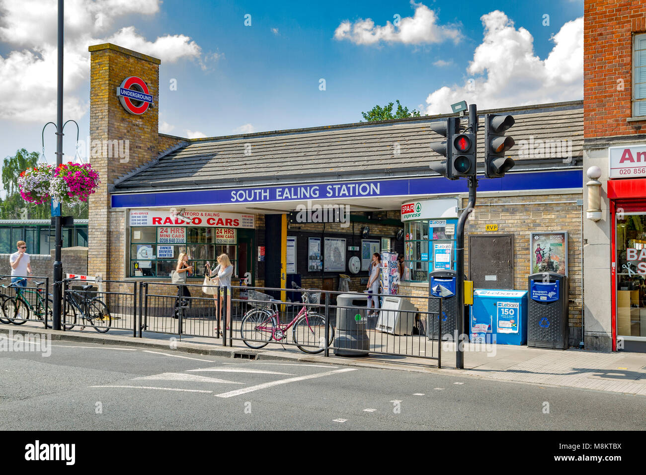 People outside South Ealing Underground station on The Piccadilly line ...