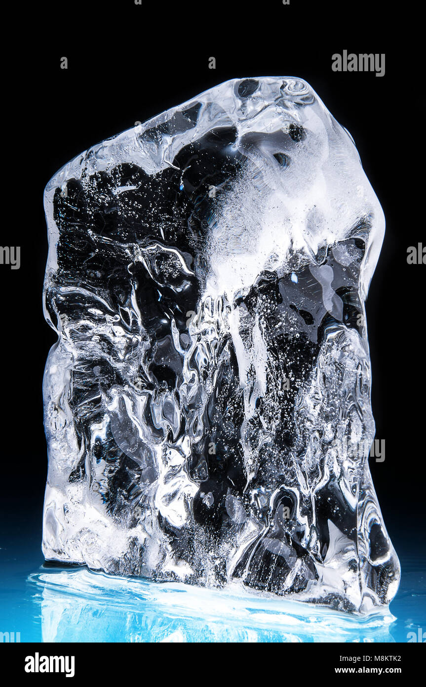 Transparent water ice block, black background Stock Photo - Alamy