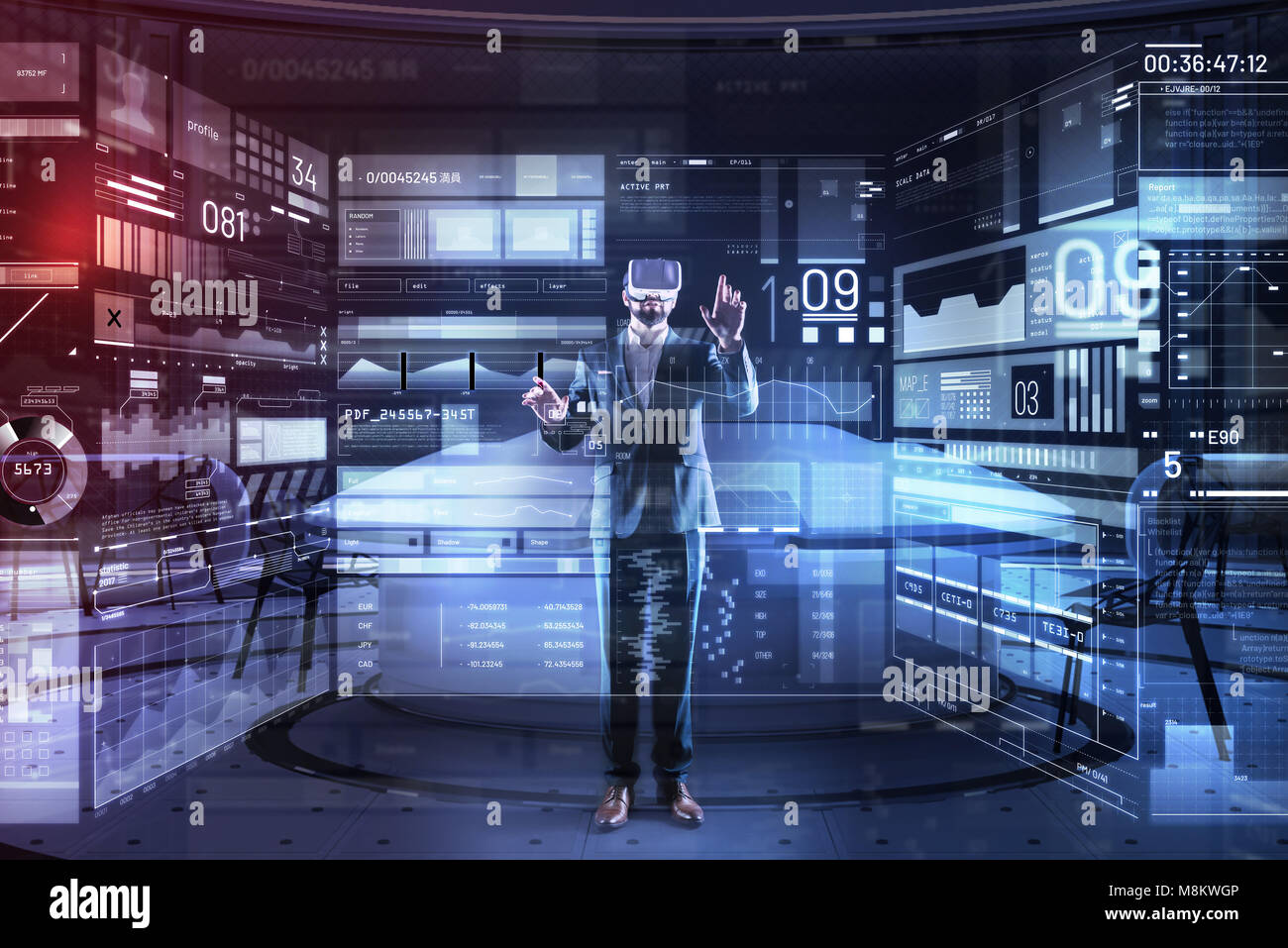 Concentrated programmer touching the screen while being in virtual ... Concentrated programmer touching the screen while being in virtual ...