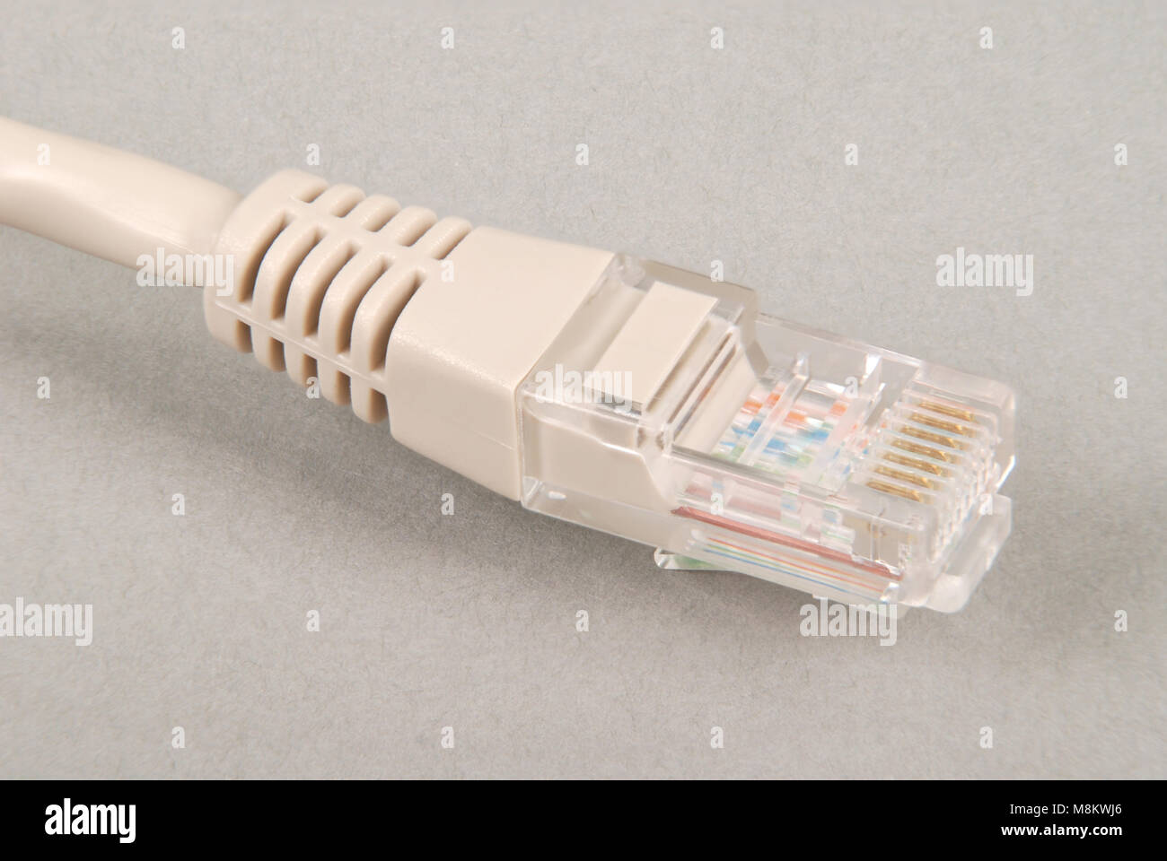 Lan cable and connector RJ45, isolated on grey background Stock Photo ...