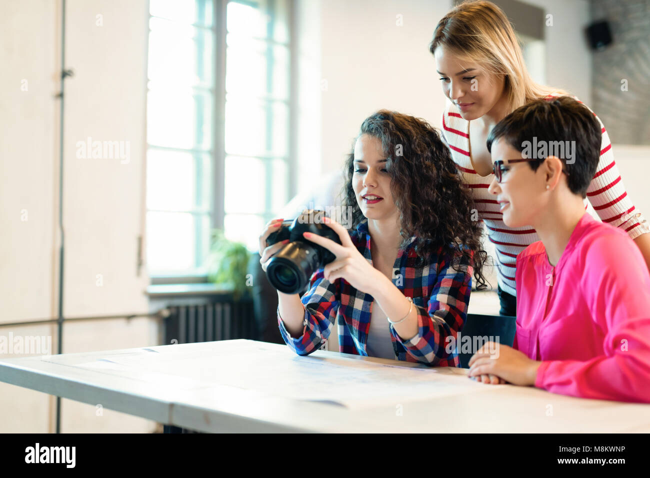 Professional photographer team hi-res stock photography and images - Alamy