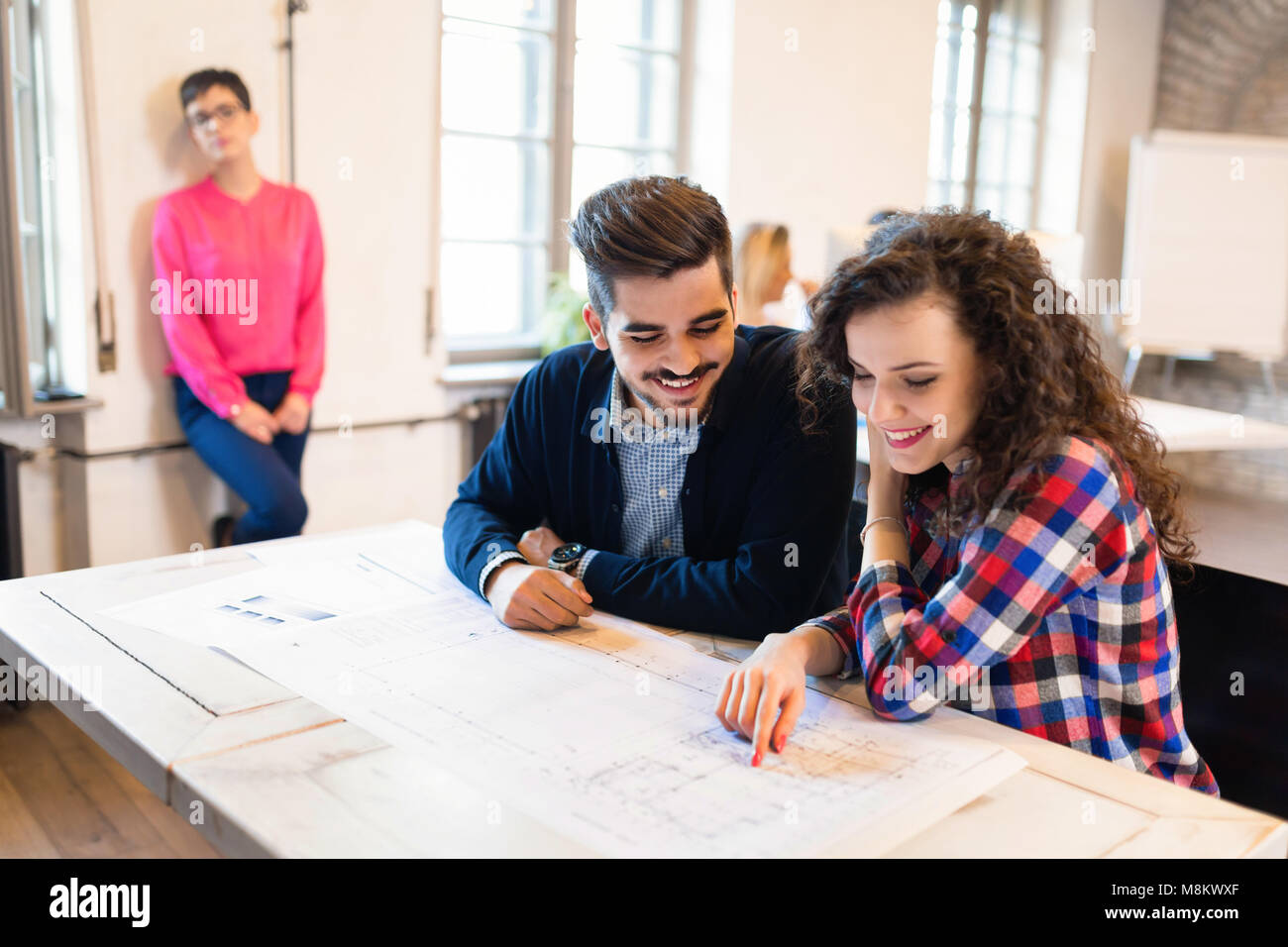 Professional creative team working on hi-res stock photography and ...