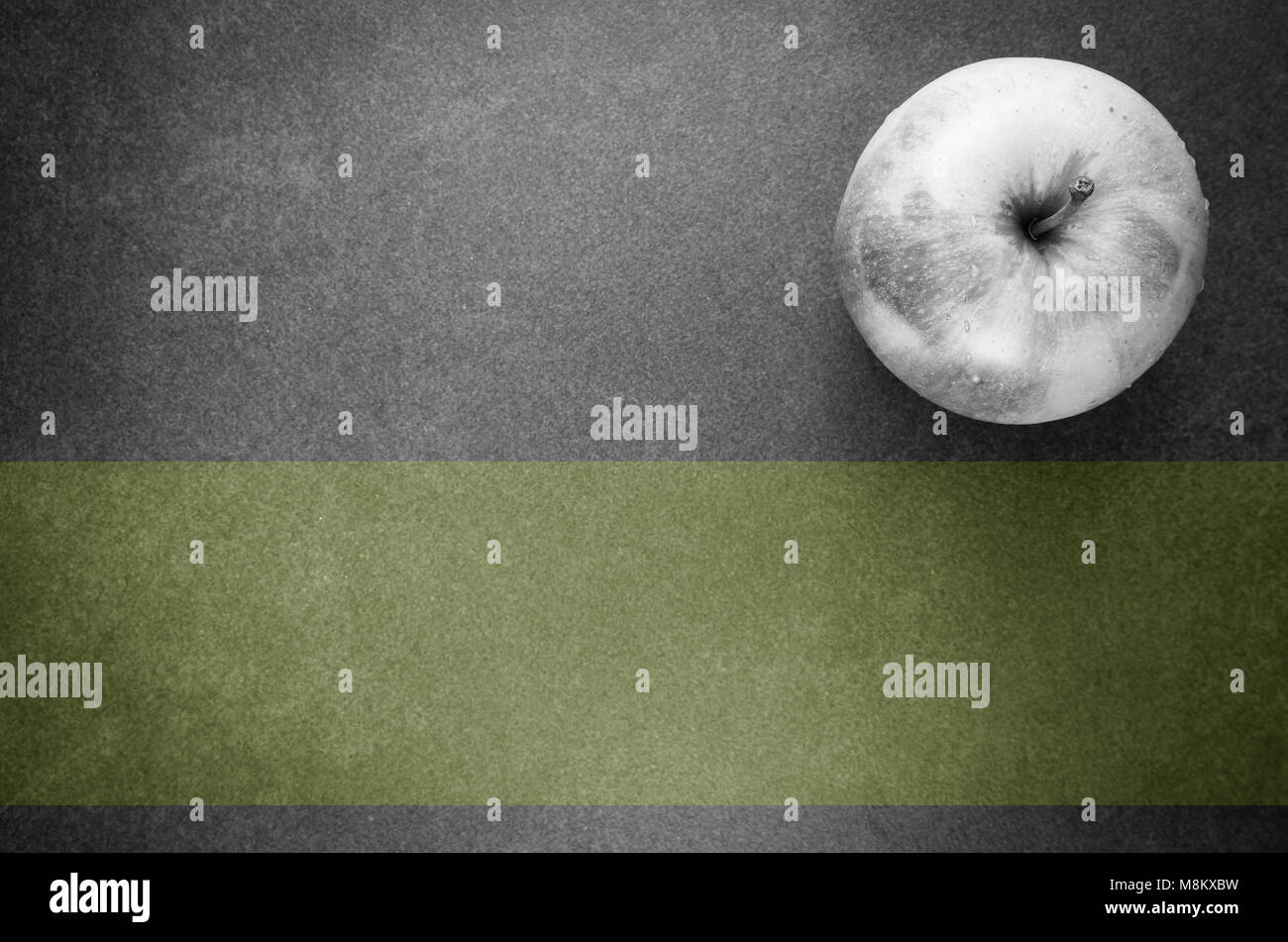 apple on a dark rough surface with color user space - top view Stock ...