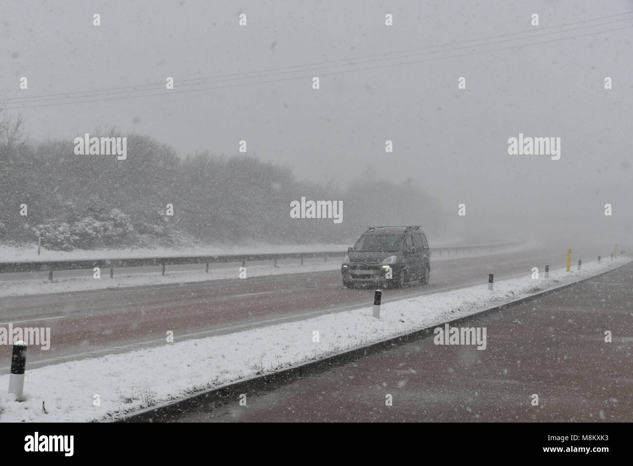 Exeter, Devon, UK. 18th March 2018. UK Weather. Heavy snow and ...