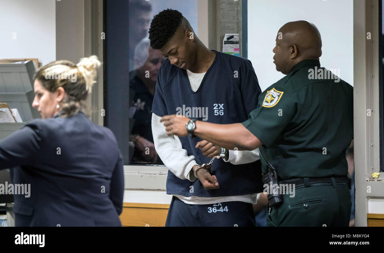 West Palm Beach, Florida, USA. 18th Mar, 2018. Derek Jupiter enters court Sunday morning, March ...