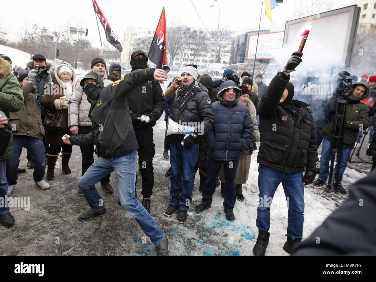 Kiev, Ukraine. 18th Mar, 2018. Activists of OUN nationalist party throw ...
