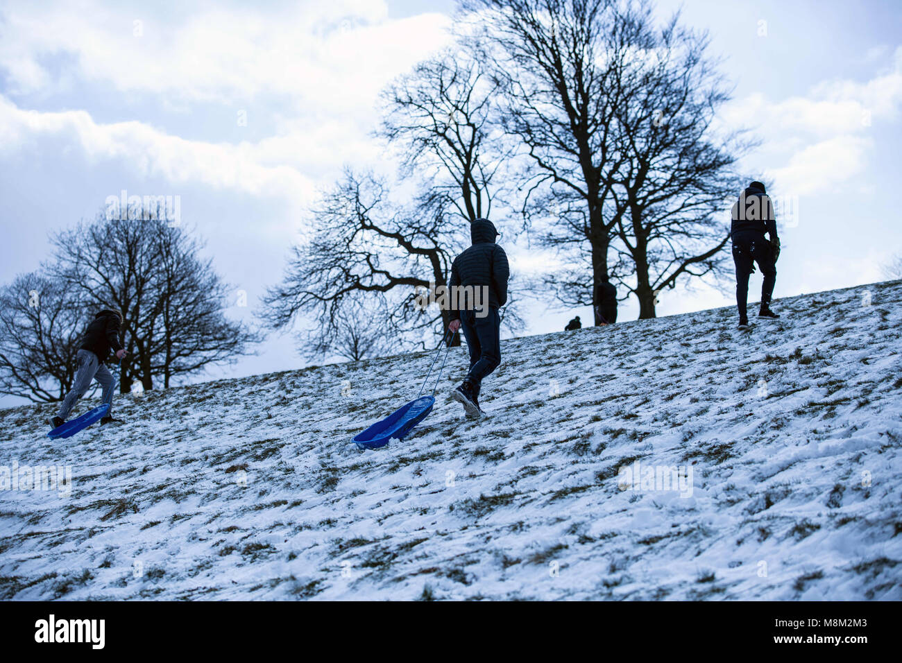 Leeds, Yorkshire, UK. 18th Mar, 2018. People seen using their sleds in ...