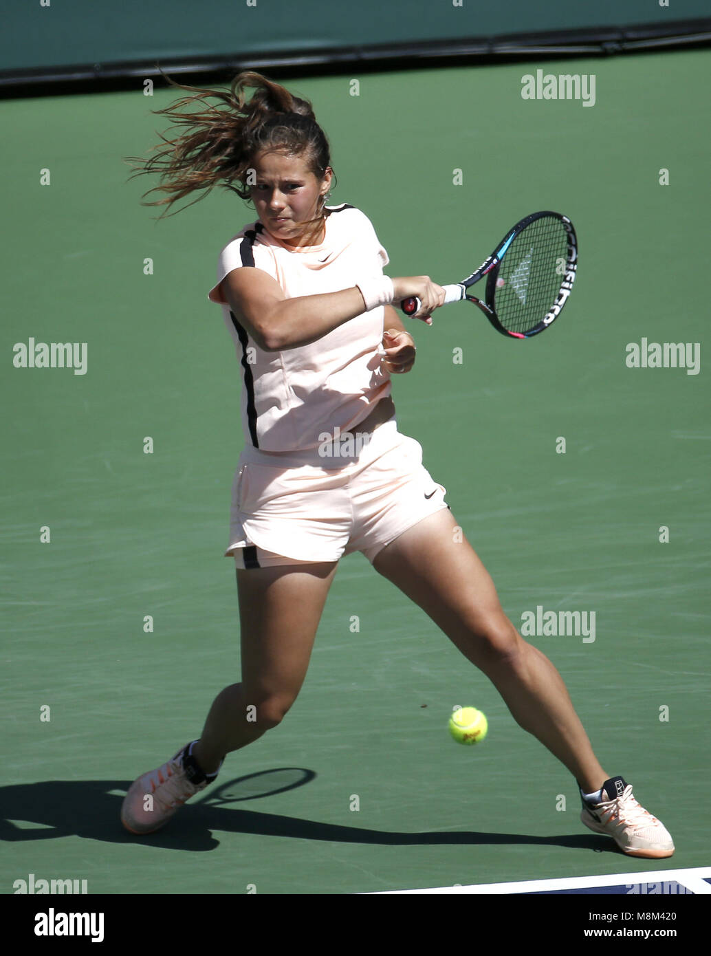 Los Angeles, California, USA. 18th Mar, 2018. Daria Kasatkina retunes a ...