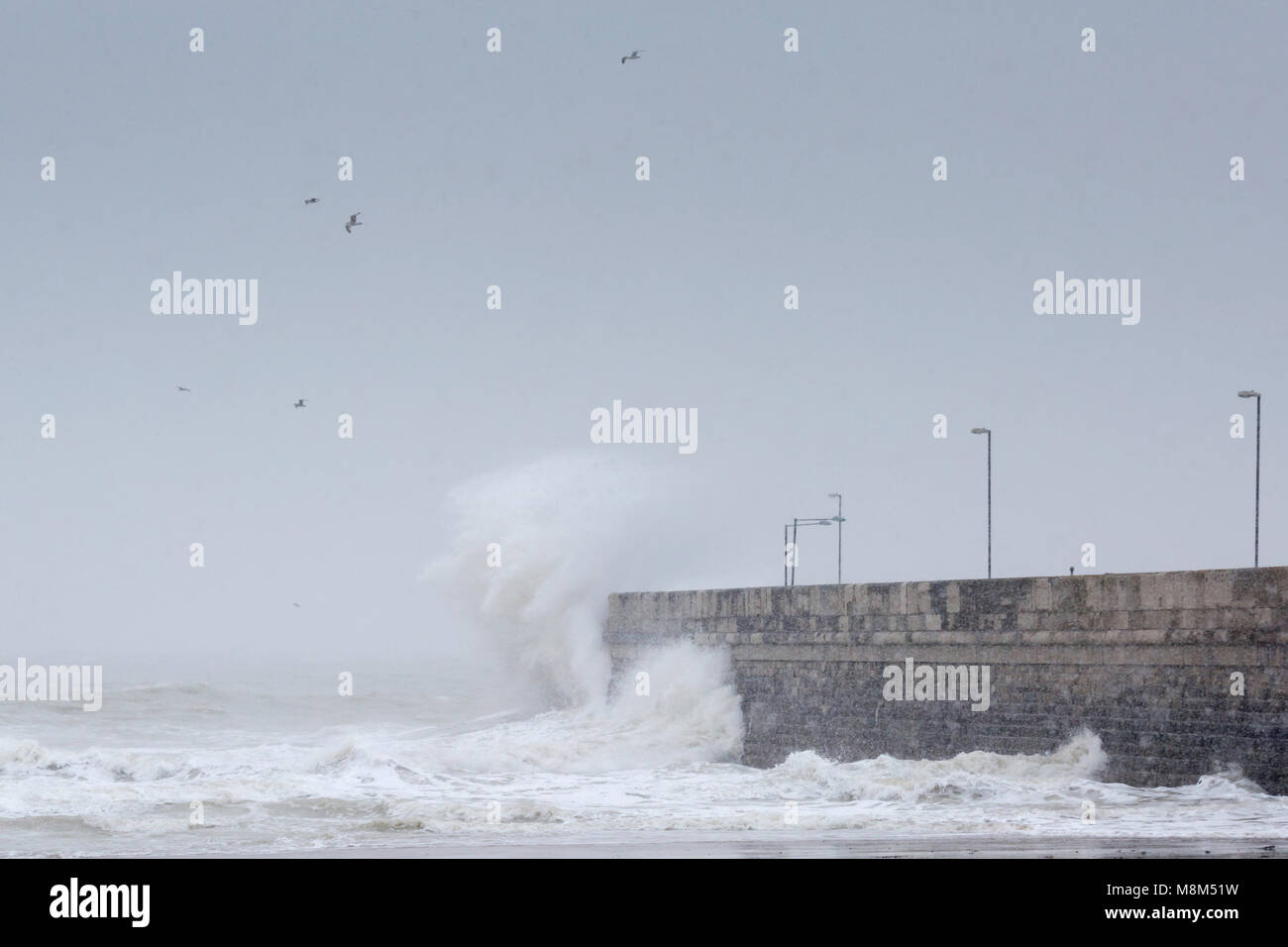 Ramsgate, Kent, UK 18th March, 2018. A large wave crashes into the ...