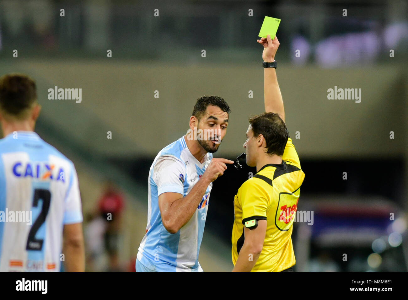Curitiba, Brazil. 18th Mar, 2018. Luizao complains of the yellow card ...