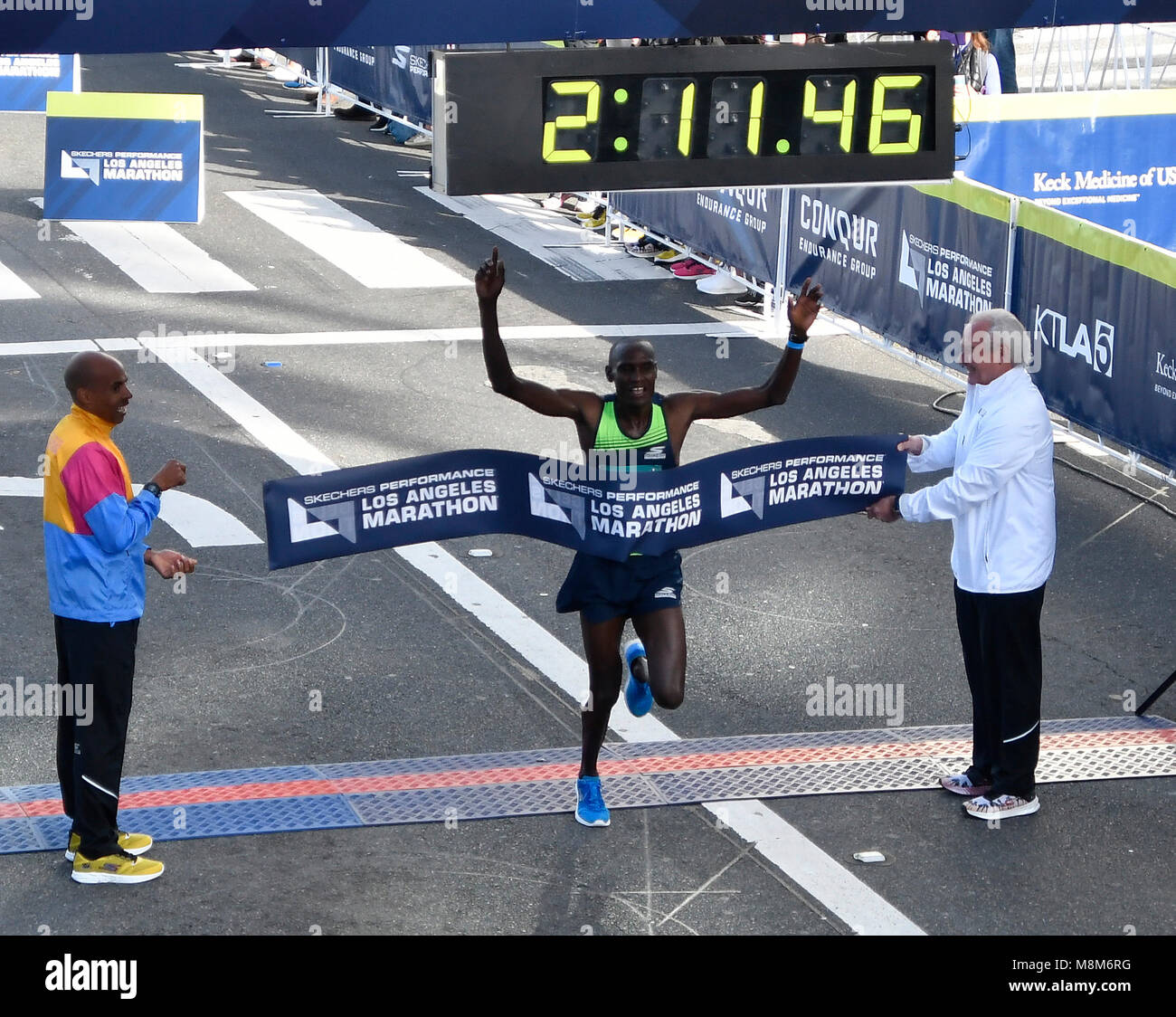 Santa Monica, USA. 18th March, 2018. Kenya's Weldon Kirui makes his way ...