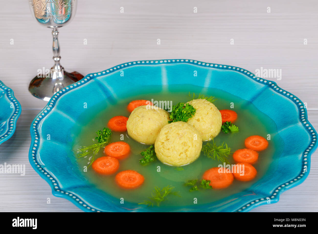 A traditional Ashkenazi Jewish soup with matzo balls, made from a ...