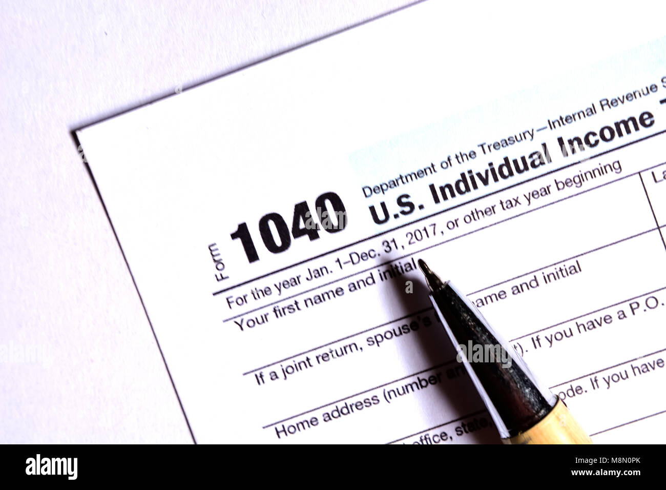 American tax form 1040 on white background. Fill-up American tax form ...