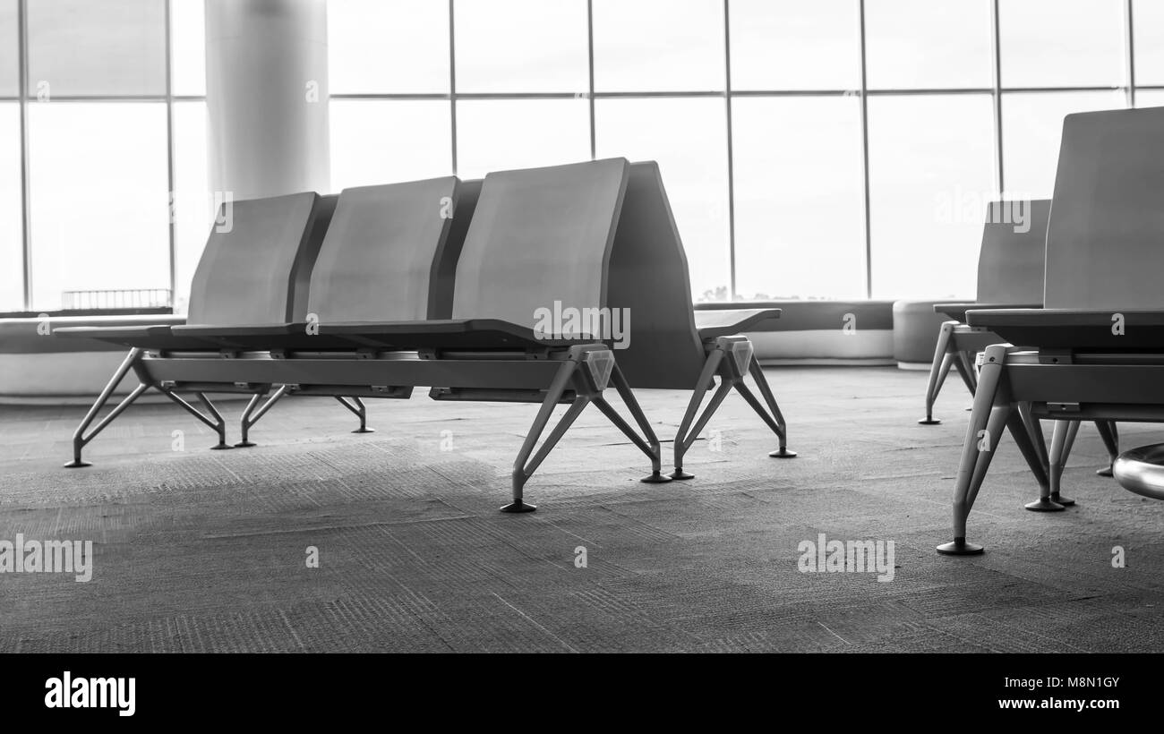 empty airport terminal waiting area with chairs. lounge in the airport ...