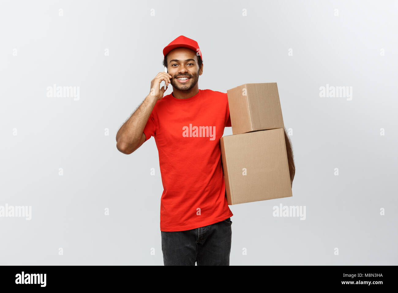 Delivery Concept - Portrait of Handsome African American delivery man ...