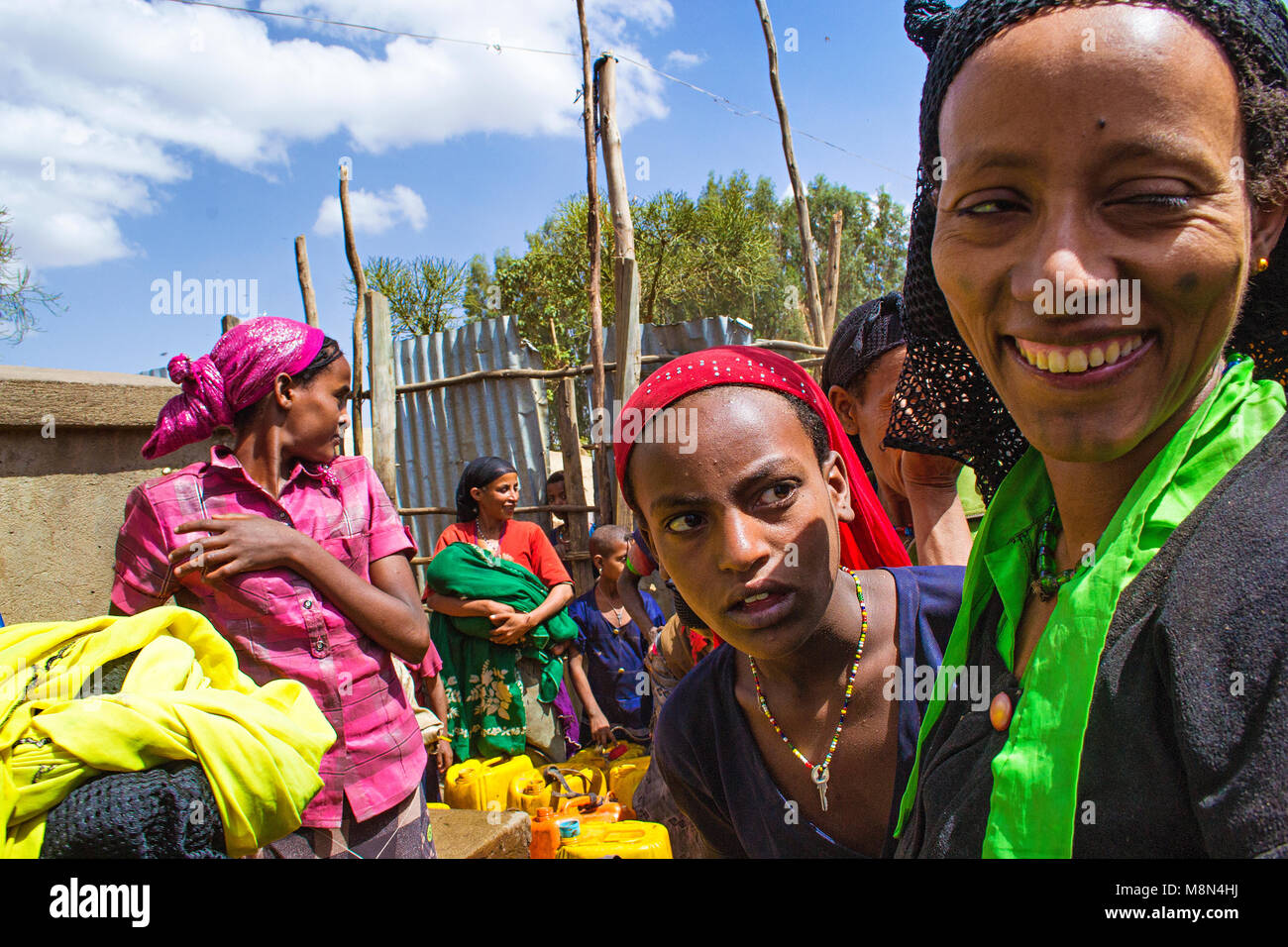 Women waiting to obtain water from the well in Ethiopia. In rural areas ...