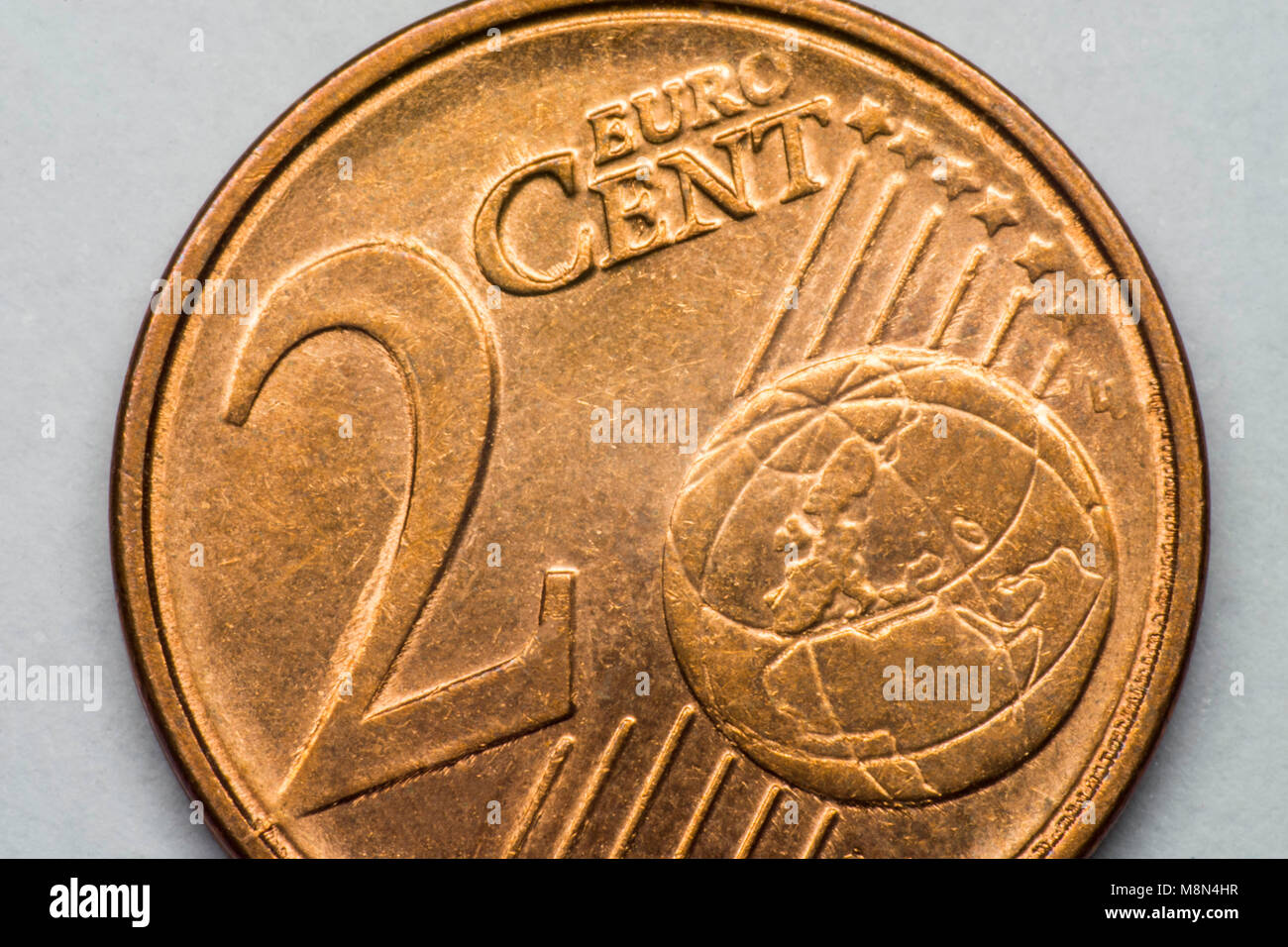 A closeup photo of two euro cent coin Stock Photo - Alamy