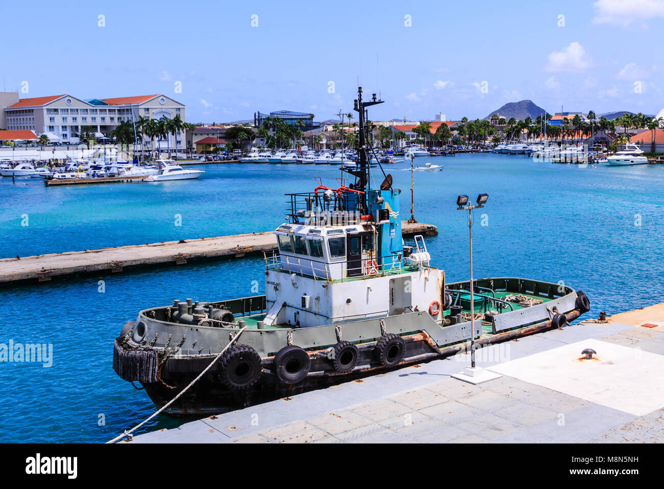 A heavy tugboat tied up at the dock on Aruba Stock Photo - Alamy