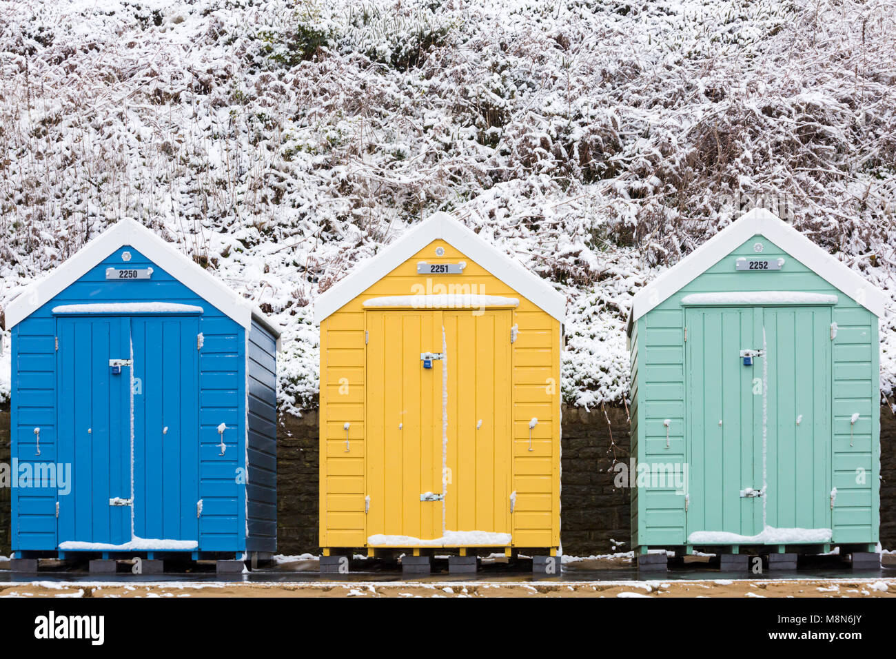 Beach huts in the snow Bournemouth beach seaside at Bournemouth, Dorset ...